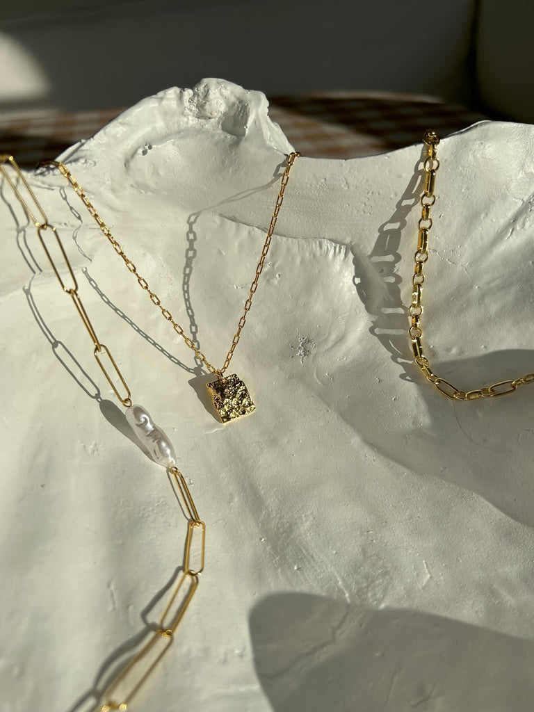 How To Layer Up Your Chains For S/S